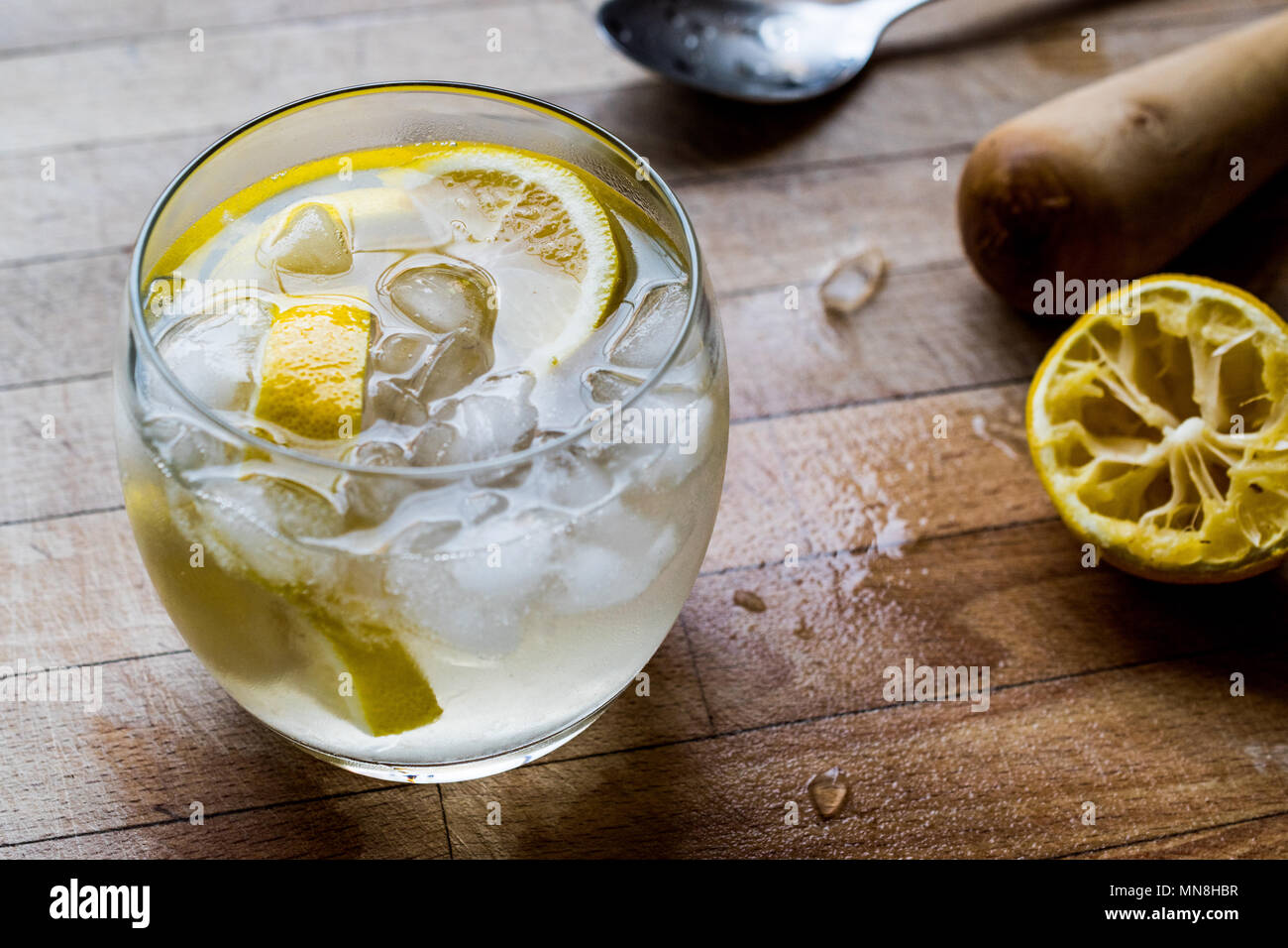 Tom Collins Cocktail with lemon and ice. Beverage Concept Stock Photo ...