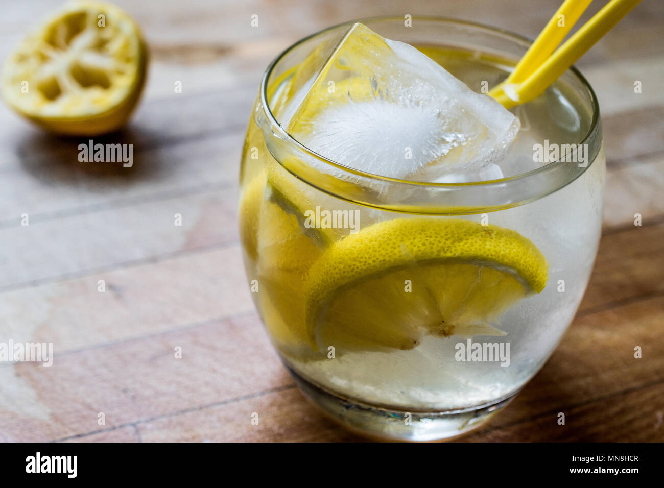 Tom Collins Cocktail with lemon and ice. Beverage Concept Stock Photo ...