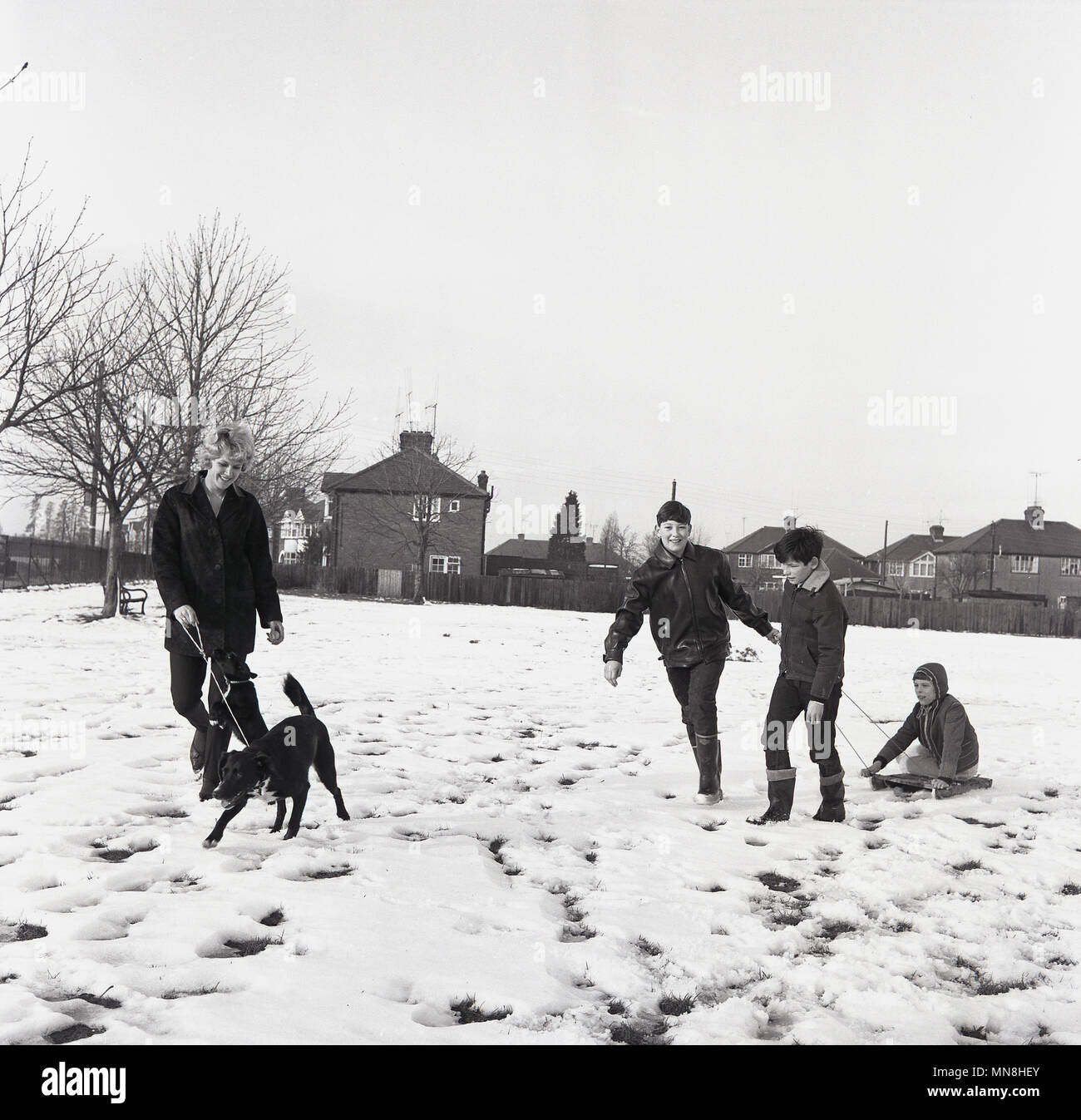 1965, January, wintertime and a mother, her three sons and the family ...