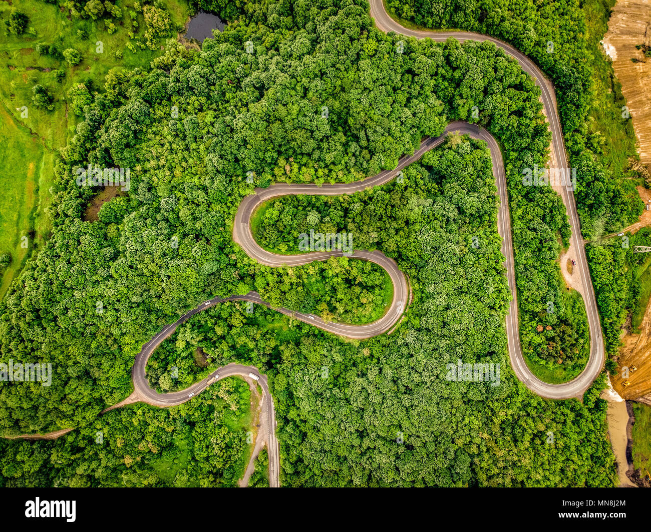 Roads from above extreme winding road in the mountains aerial view ...