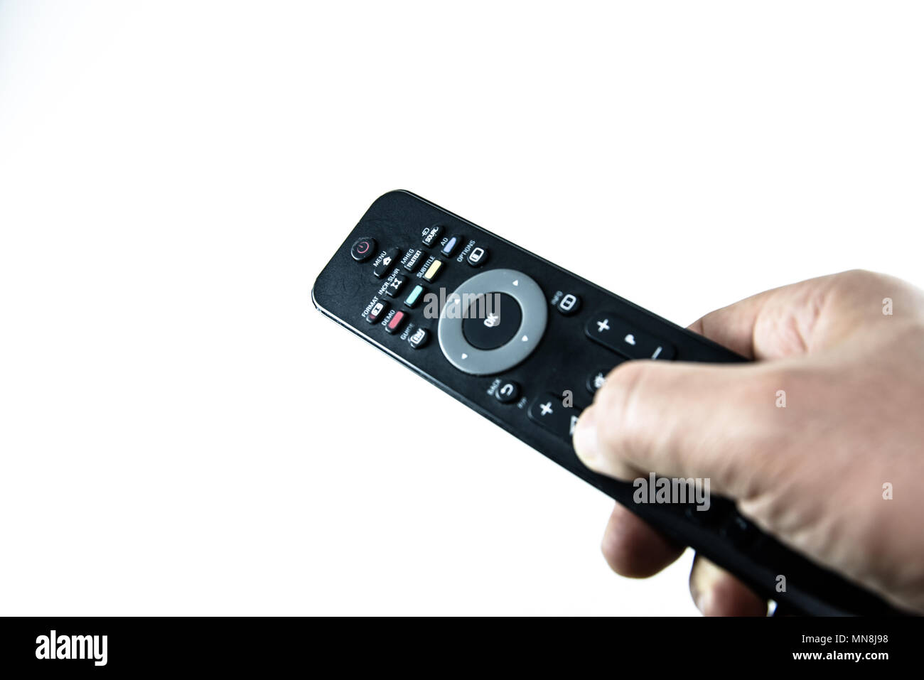 Man holding tv remote hi-res stock photography and images - Alamy