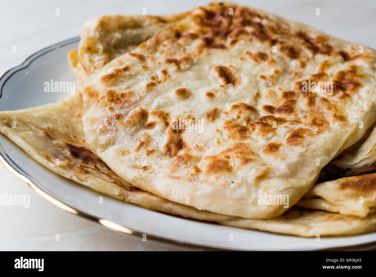 Traditional Qutab or Gozleme made with Dough, Minced Meat or Cheese ...
