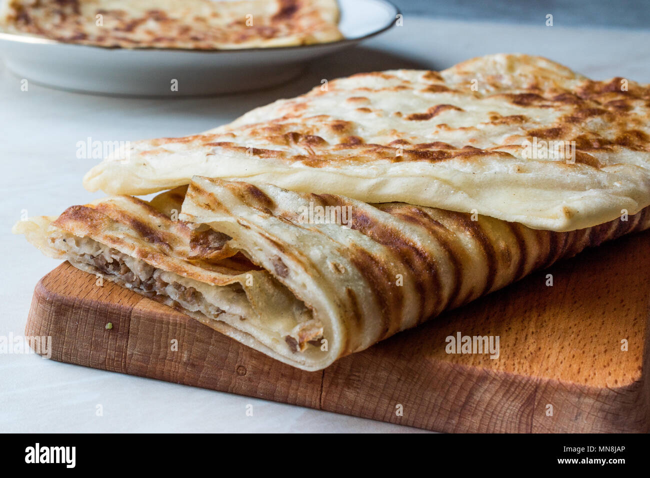 Traditional Qutab or Gozleme made with Dough, Minced Meat or Cheese ...