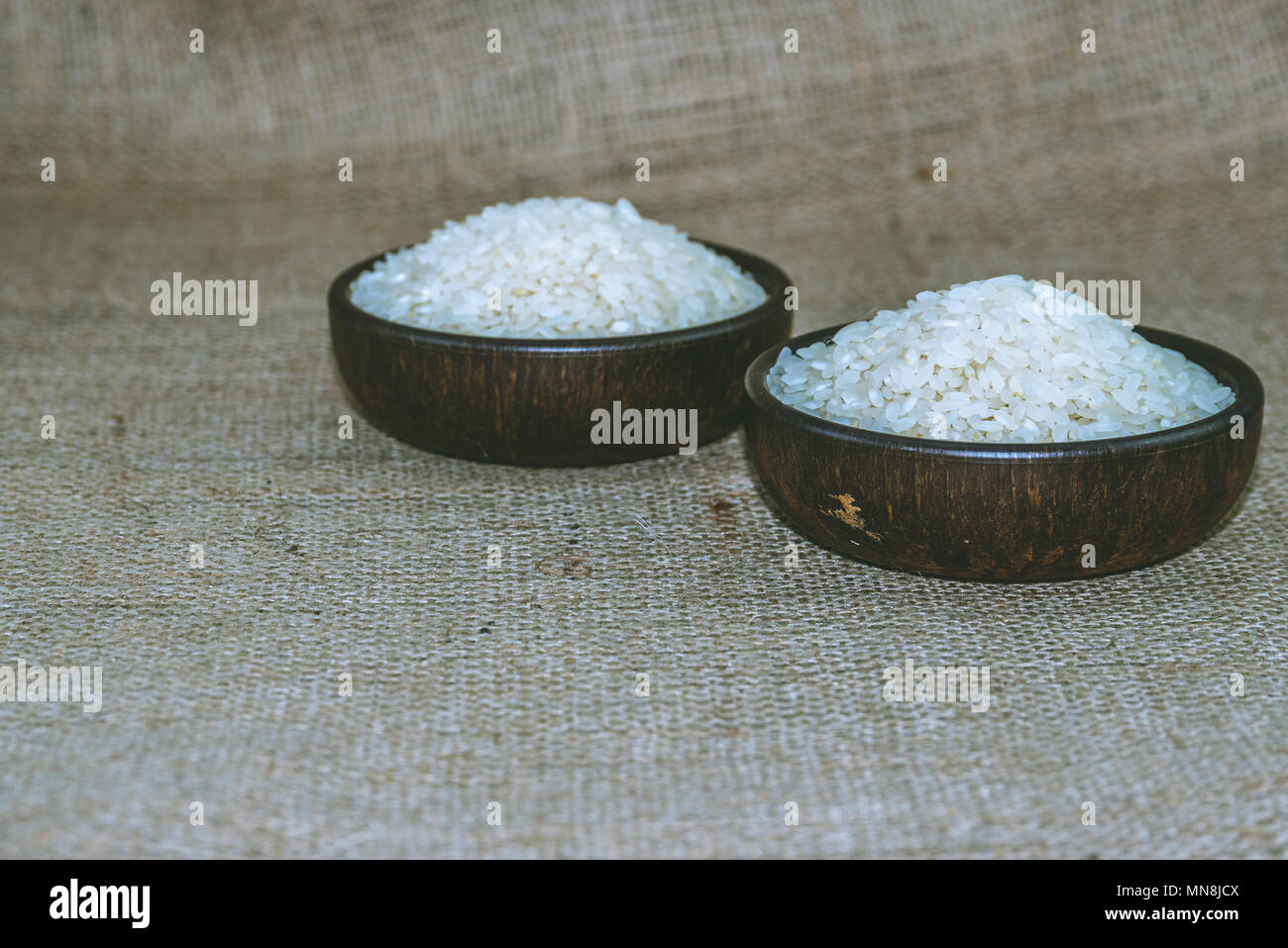rice in wooden bow Stock Photo - Alamy
