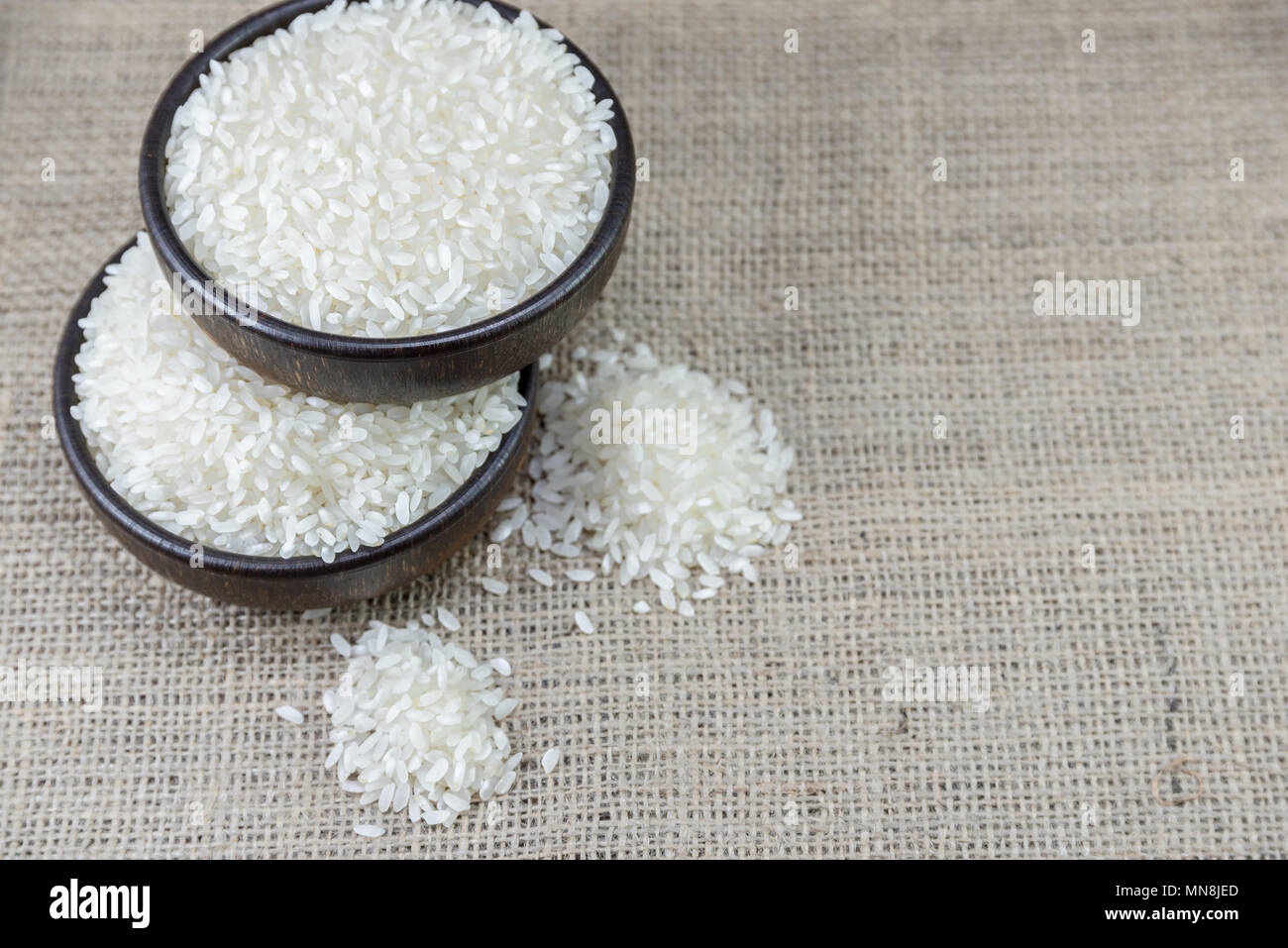 rice in wooden bow Stock Photo - Alamy