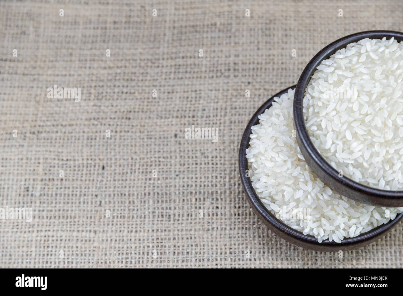 rice in wooden bow Stock Photo - Alamy
