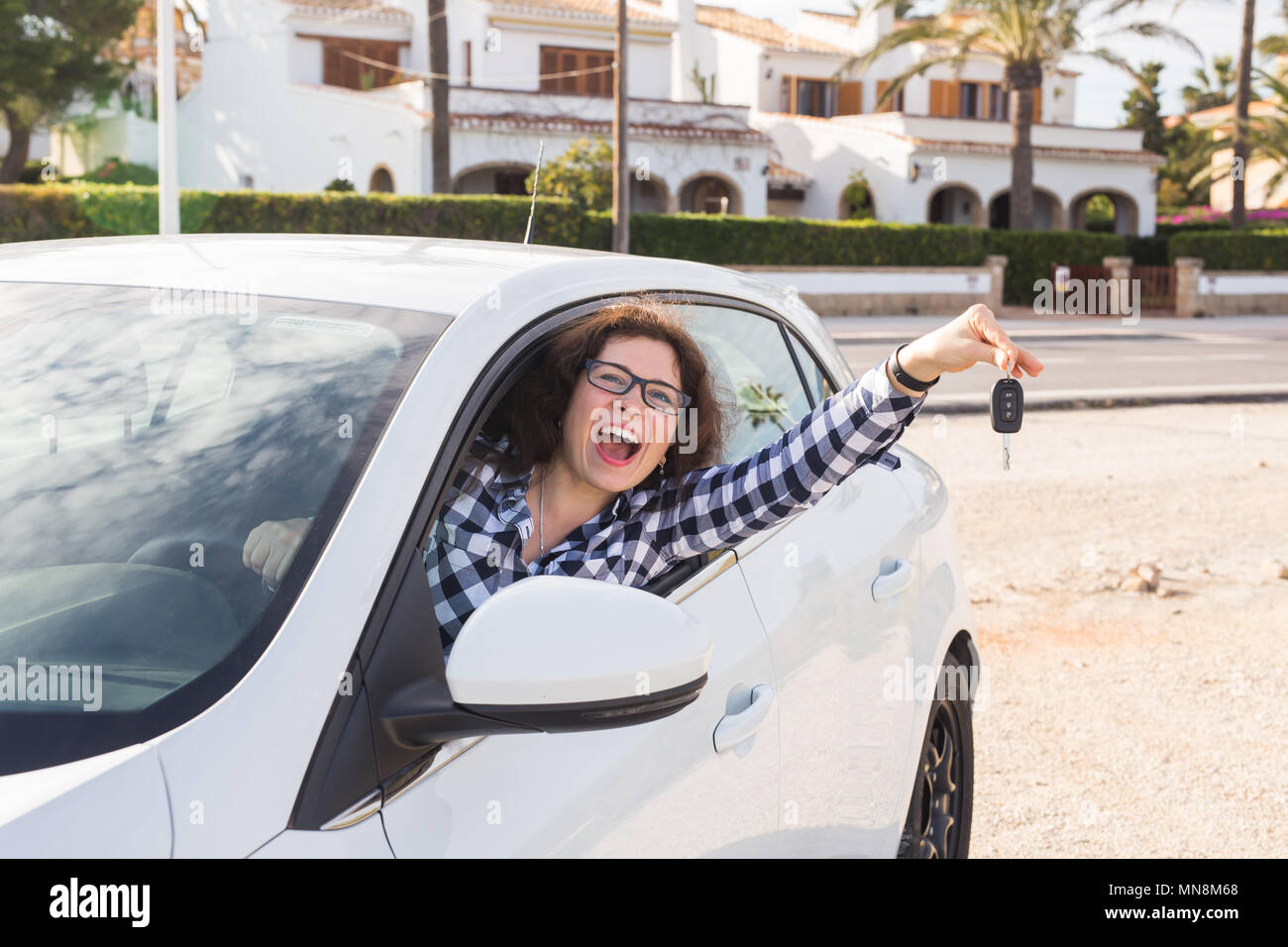 Business is delighted to have a new car and very happy Stock Photo - Alamy