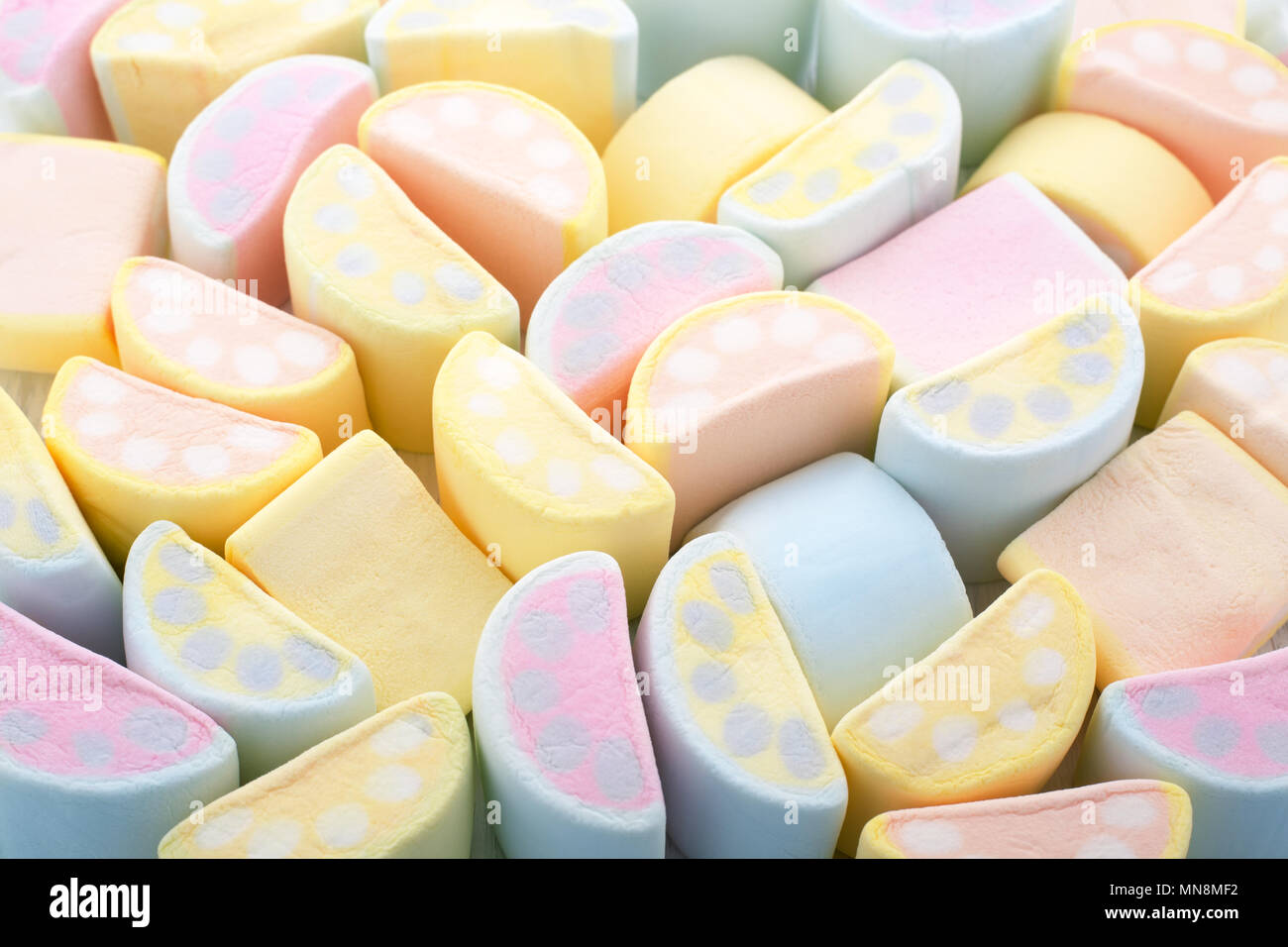 Marshmallows in crescent shape. Pastel colors trendy background or ...