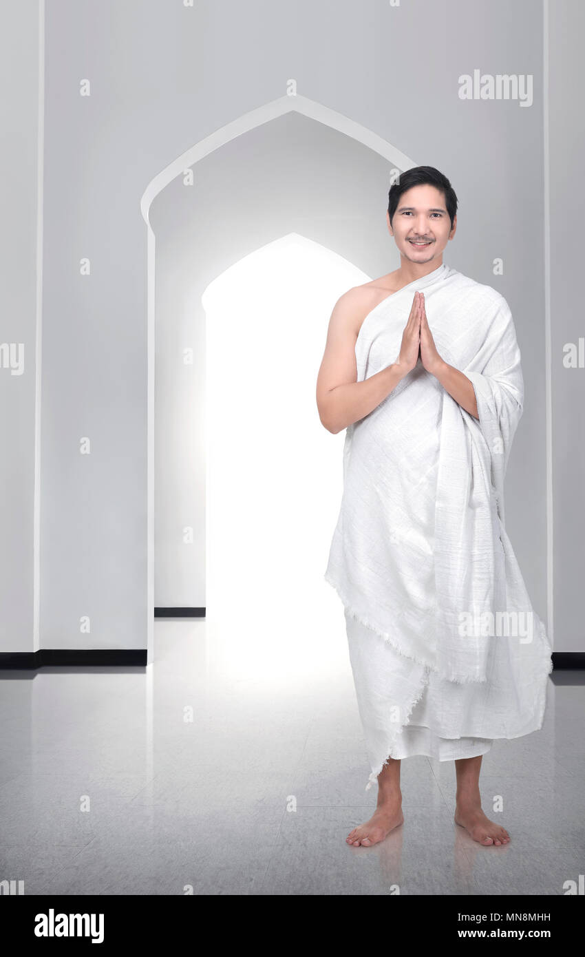 Handsome asian muslim man standing and praying in the mosque Stock ...