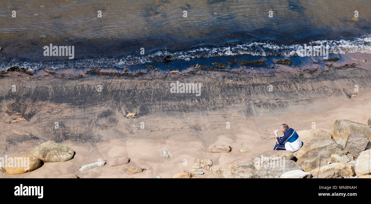 Lone man eating hi-res stock photography and images - Alamy
