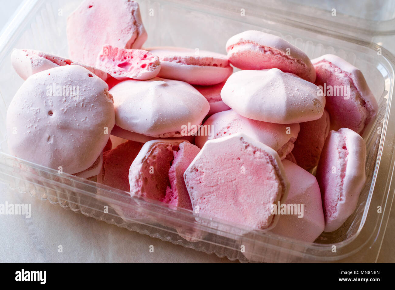 Pink Meringues in Plastic Container / Box or Package. Confectionery ...