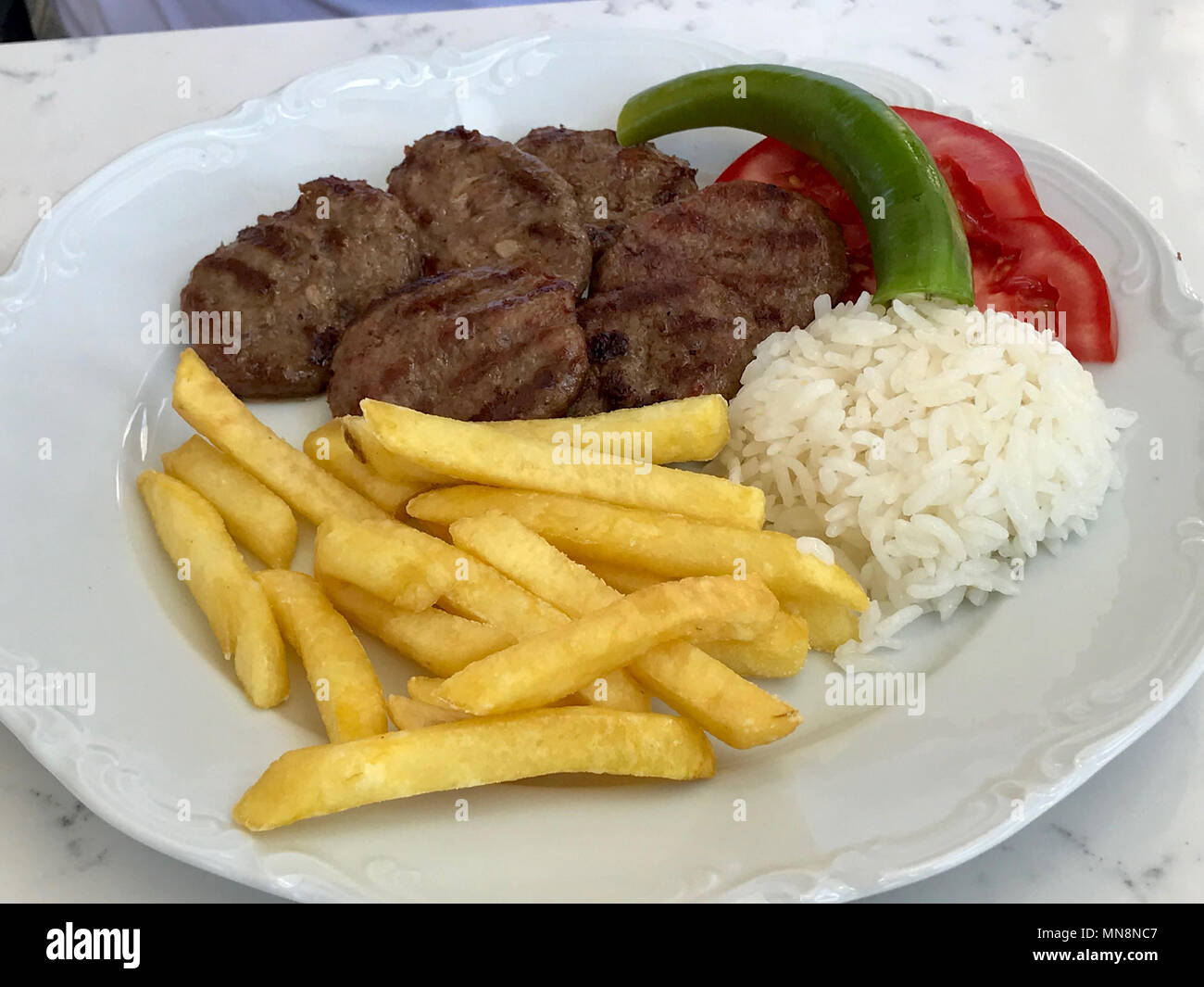 Turkish Food Kofte or Kofta / Stack of Meatballs with Rice Pilav ...