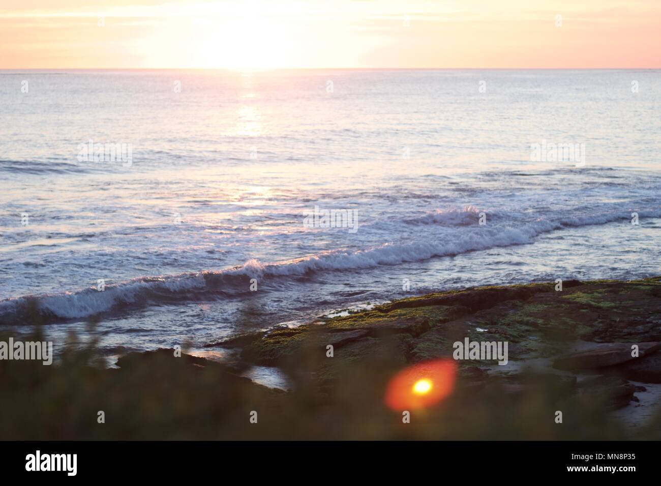 Beautiful beach sunset rolling waves hi-res stock photography and ...