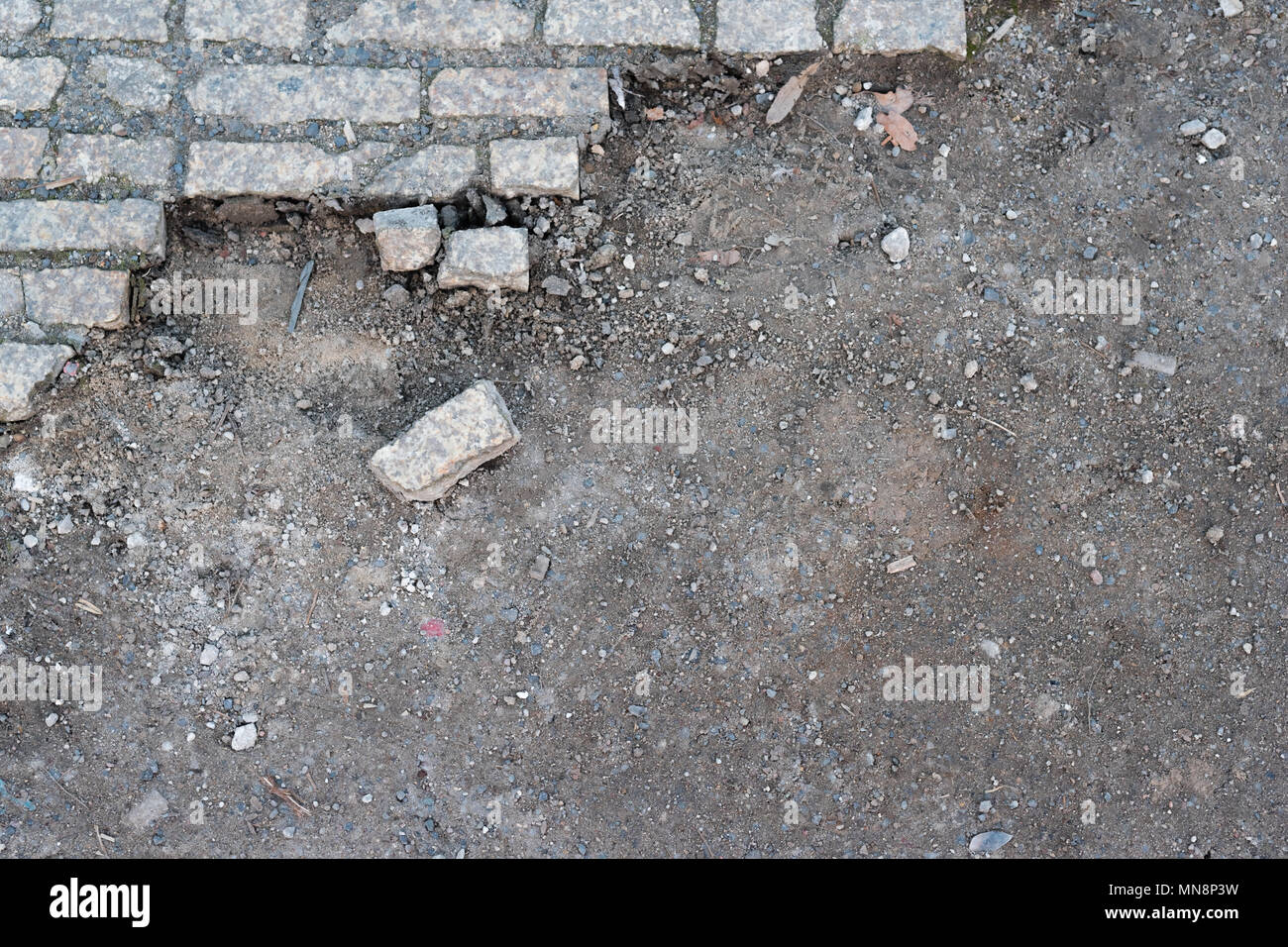 A damaged footpath Stock Photo - Alamy