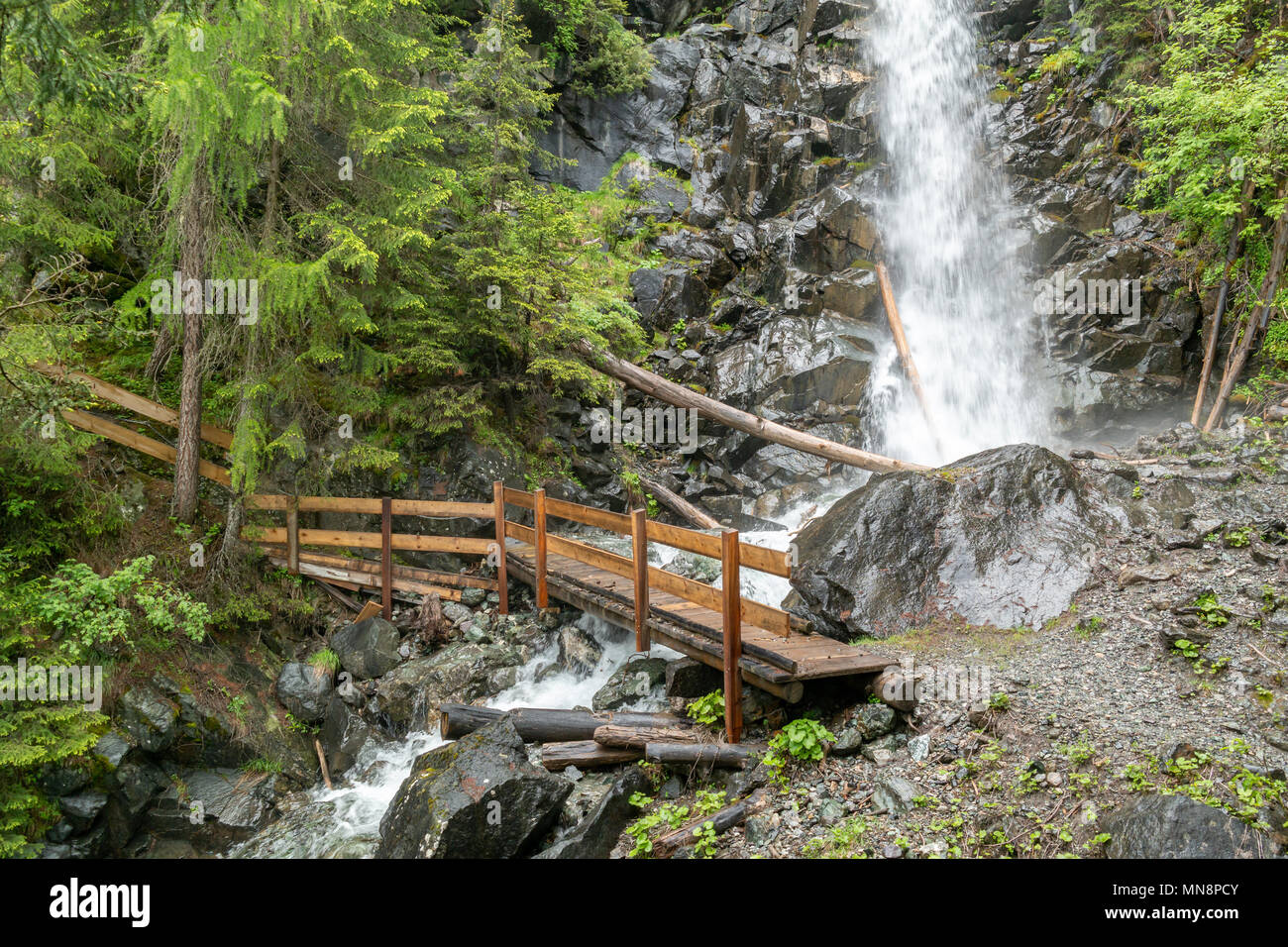 Hiking path to the small waterfall in Rona near Savognin Stock Photo ...