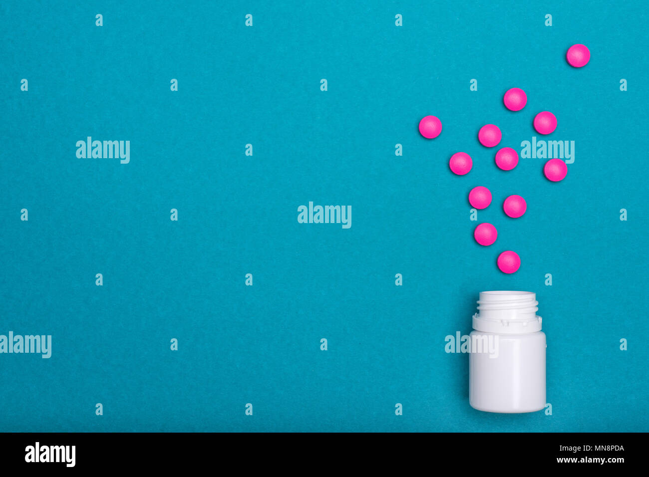 Coloured tablets bottle hi-res stock photography and images - Alamy