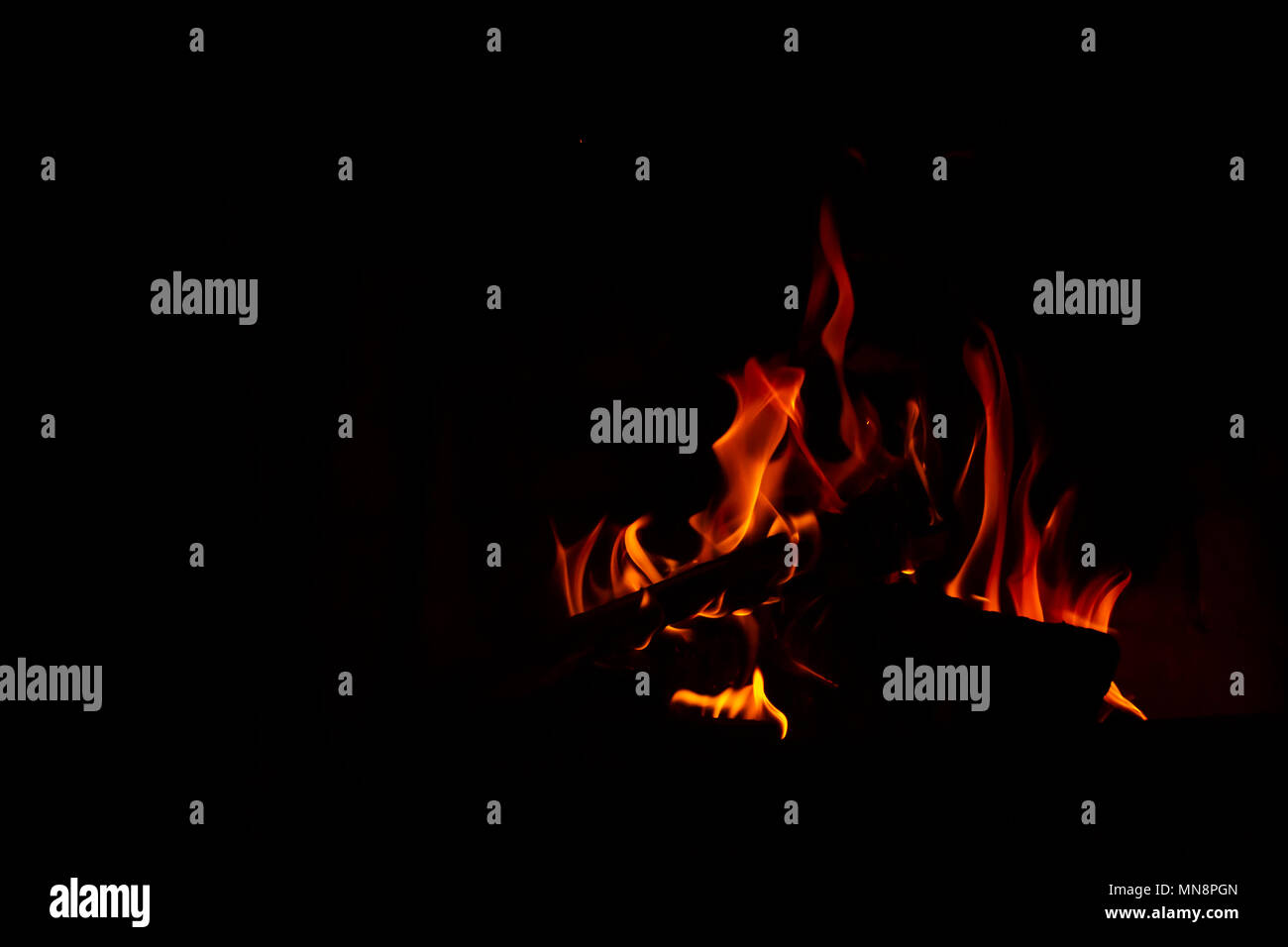 Fire flames on black background Stock Photo - Alamy