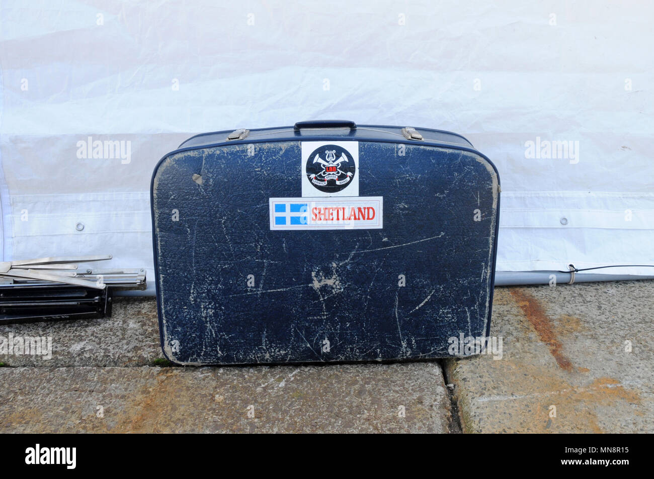 Vintage-style suitcase with a bold "Shetland" label—capturing the ...