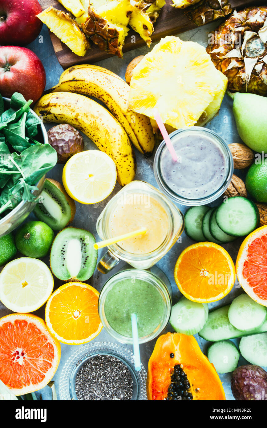 Healthy green ,mango, and blueberry detox smoothie drink in a glass ...