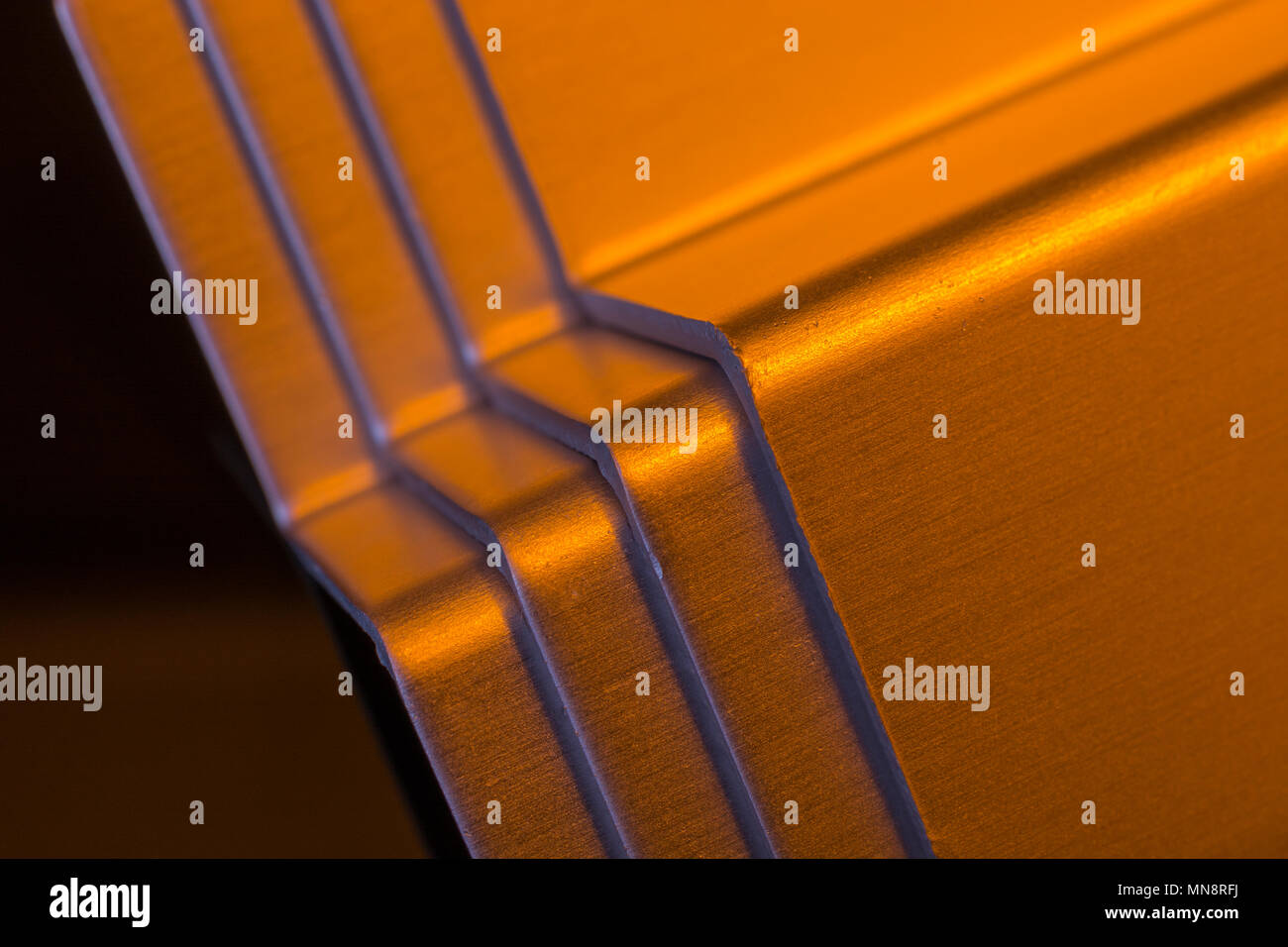 Macro close-up of aluminium bracket parts. Metaphor metalwork, metal ...