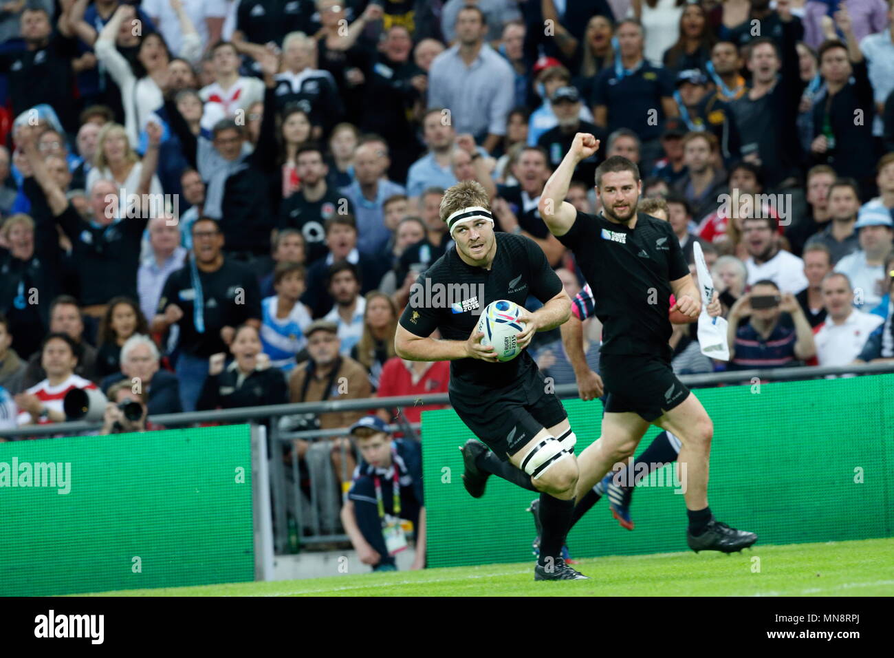 New Zealand's Sam Cane runs home his try during the RWC 2015 match ...
