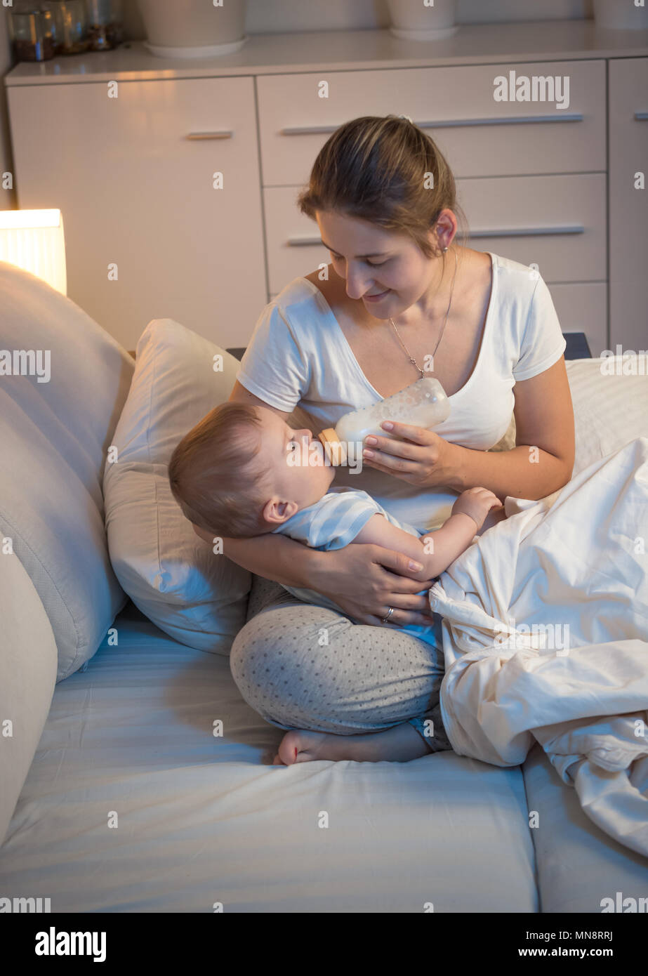 Breastfeeding hungry mother hi-res stock photography and images - Alamy
