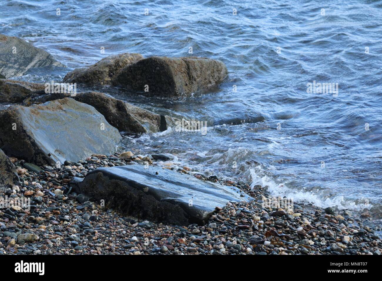 Lapping waves hi-res stock photography and images - Alamy