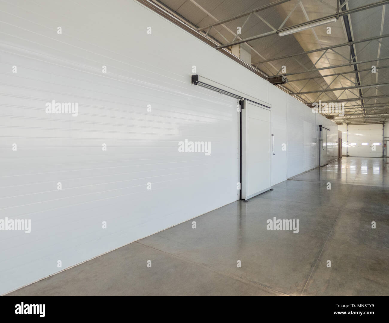 large freezer storage in the factory. closed door from warehouse Stock ...