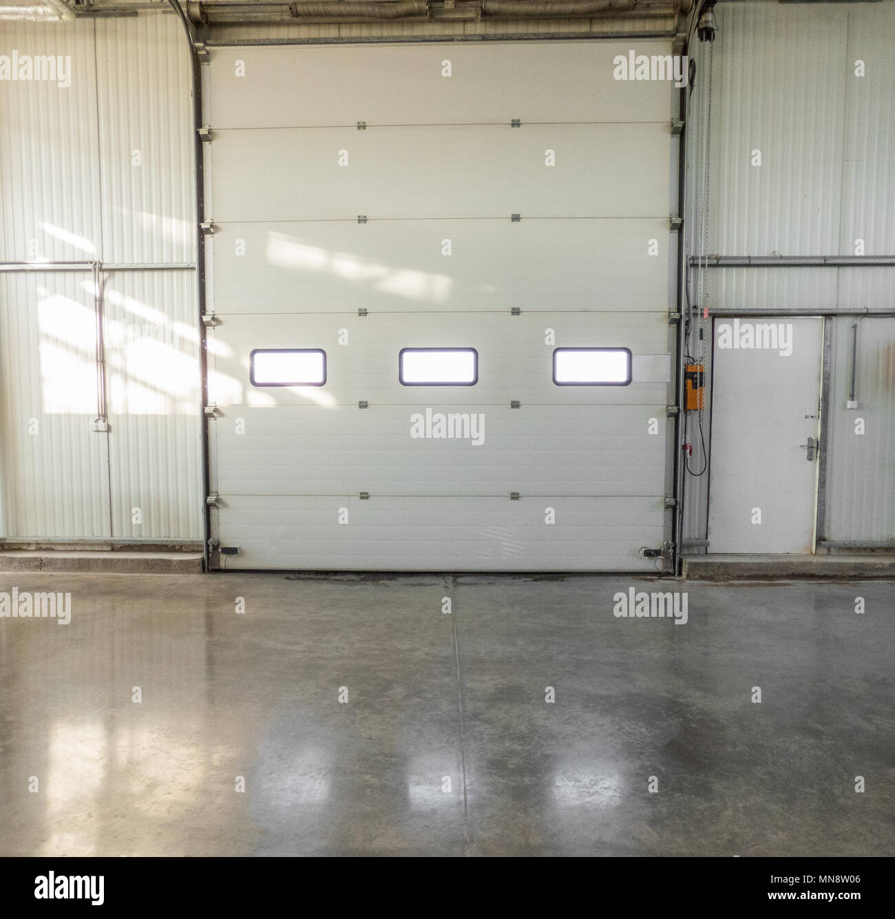 large closed gate with windows in the factory. front view Stock Photo ...