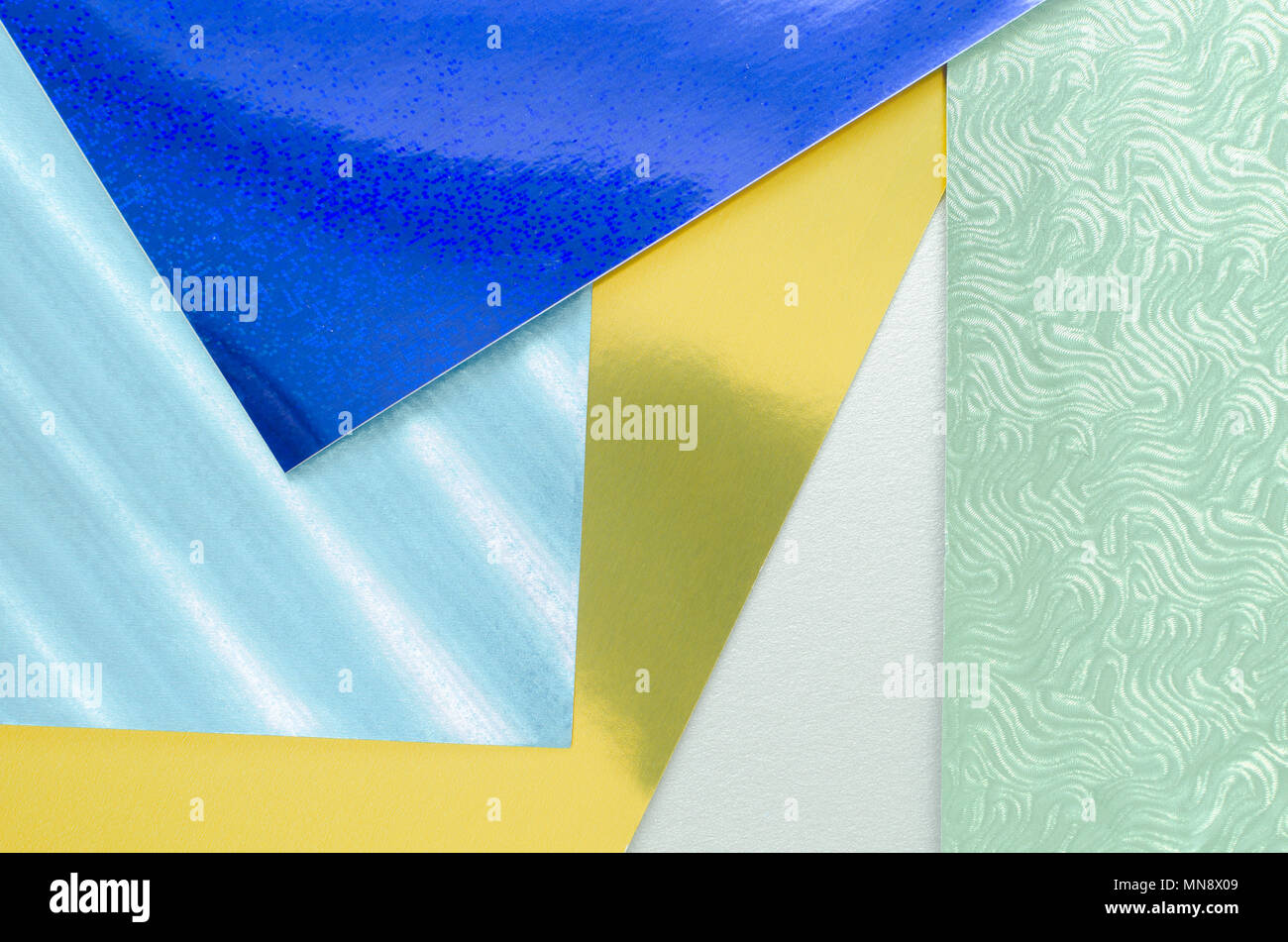 shiny textured construction paper sheets thrown together Stock Photo ...