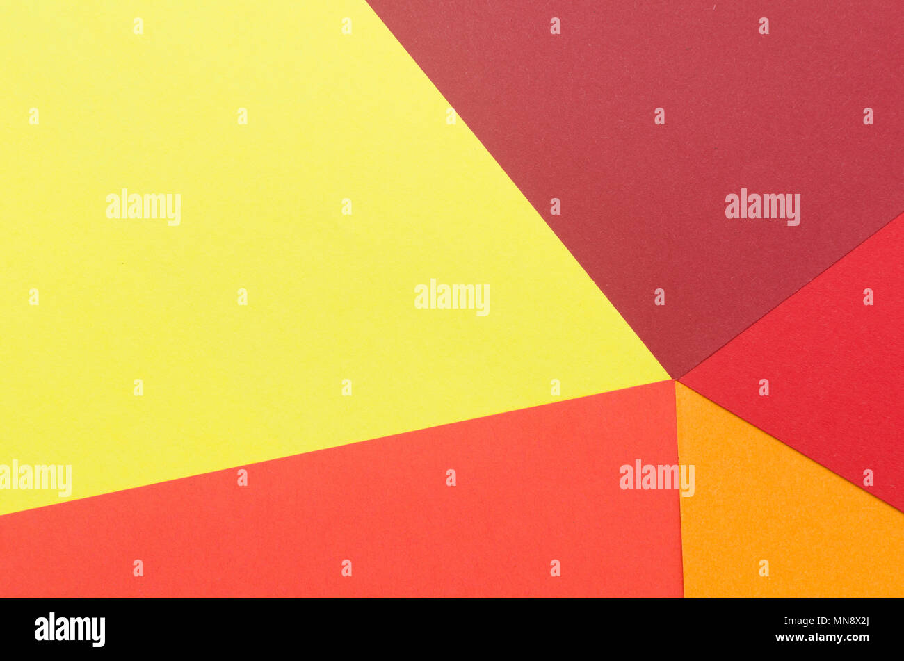 warm-colored paper sheets arranged to form rays Stock Photo - Alamy