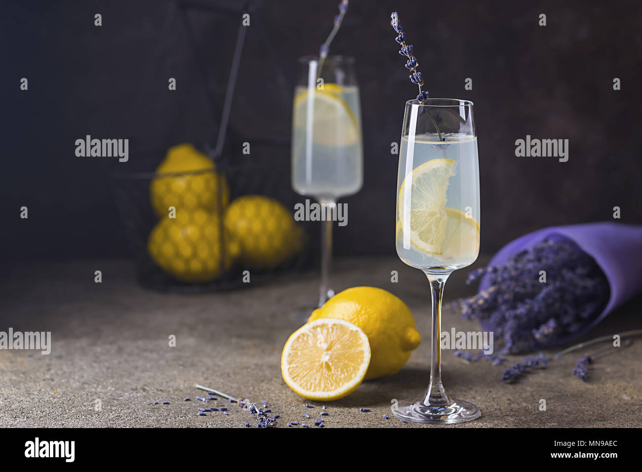 Lemonade with lemons and lavender on black stone table Stock Photo - Alamy