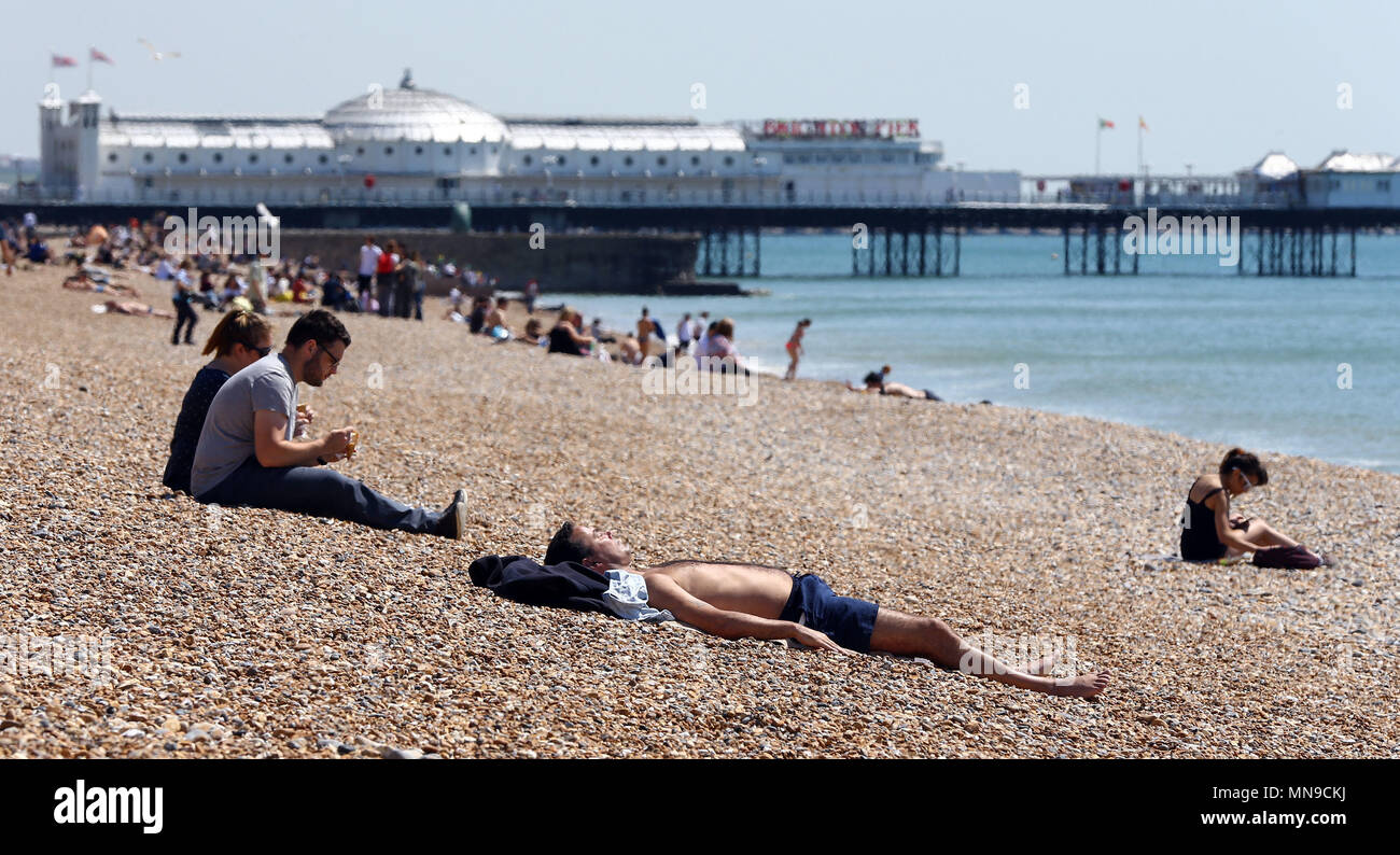 People enjoy sunshine on beach hi-res stock photography and images - Alamy