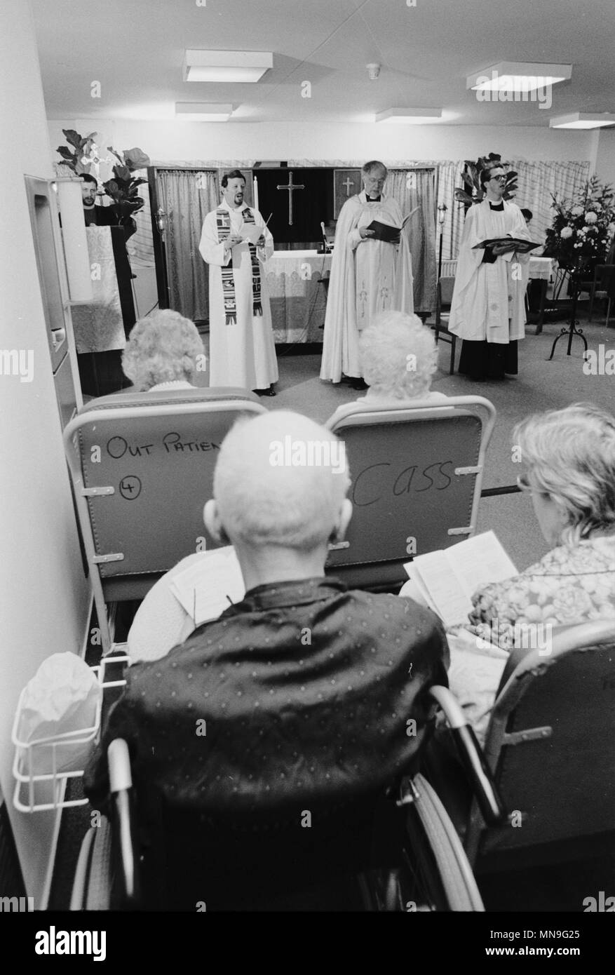 The Archbishop of Canterbury, Dr Robert Runcie (centre), in front of a ...