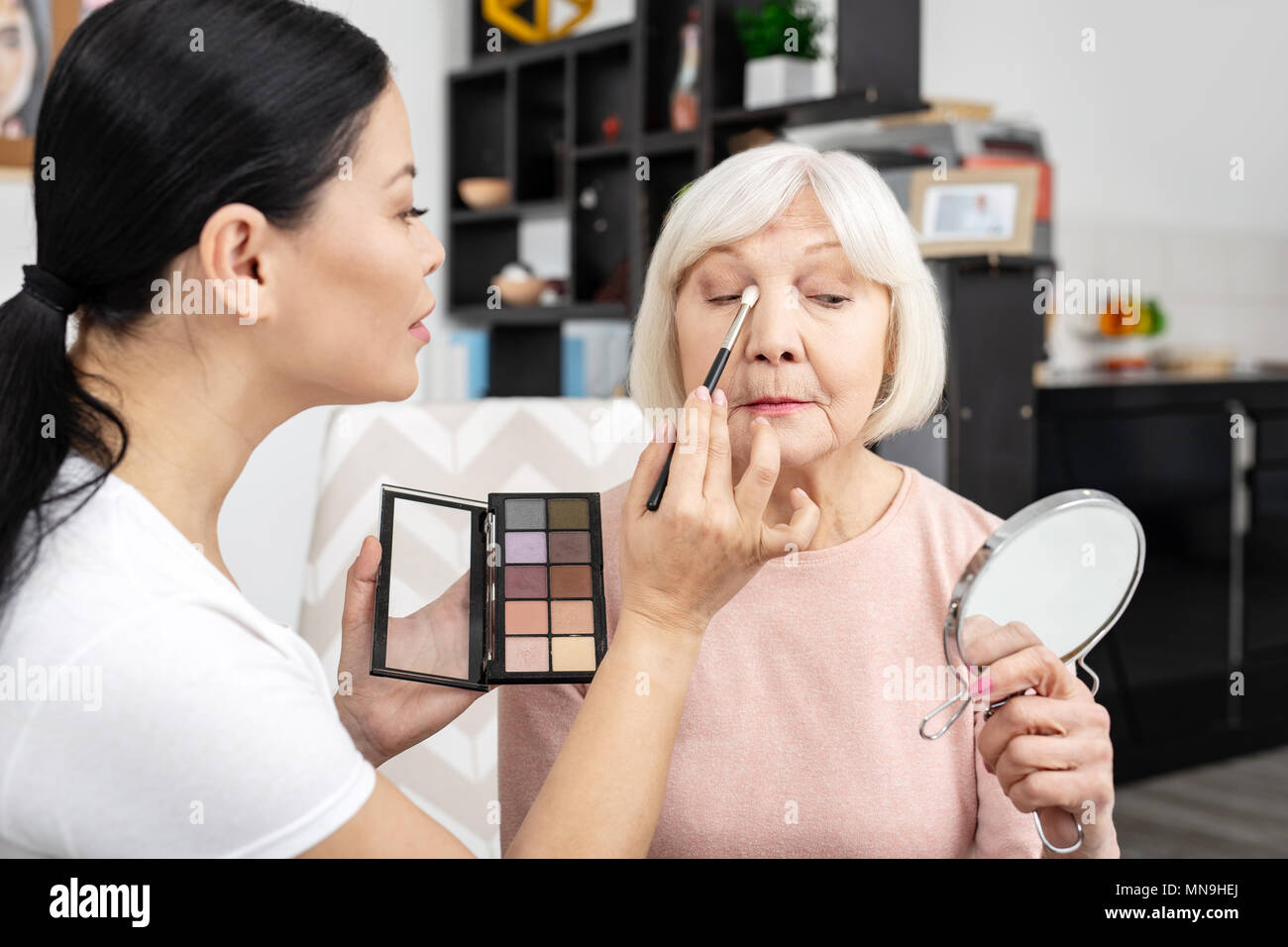 Focused senior asian female hi-res stock photography and images - Alamy