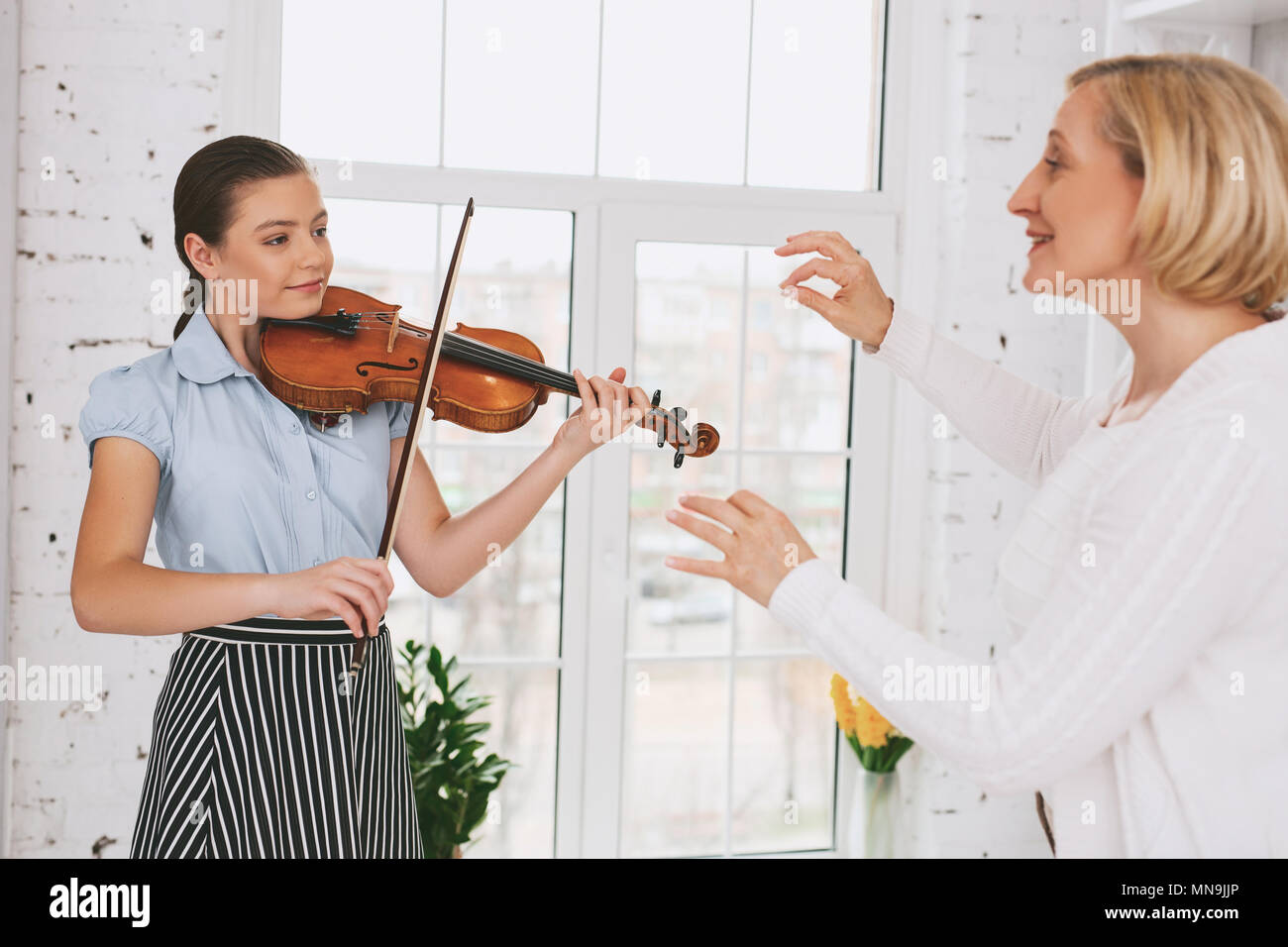 Female private tutor hi-res stock photography and images - Alamy