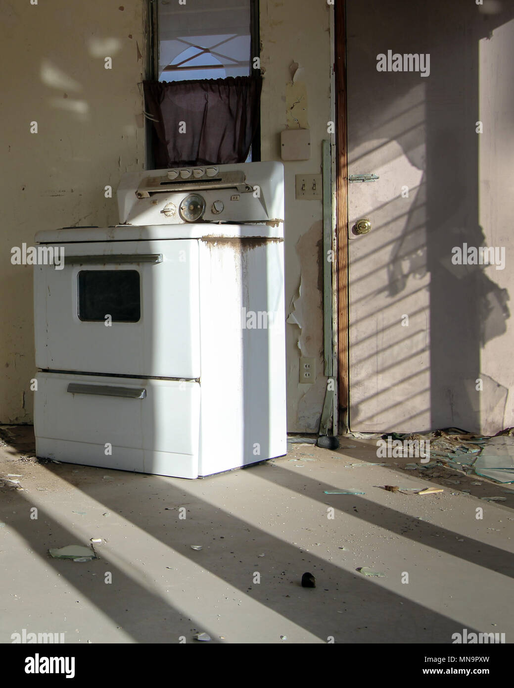 Cooker, stove, kitchen, high contrast shadows and sunlight, abandoned ...