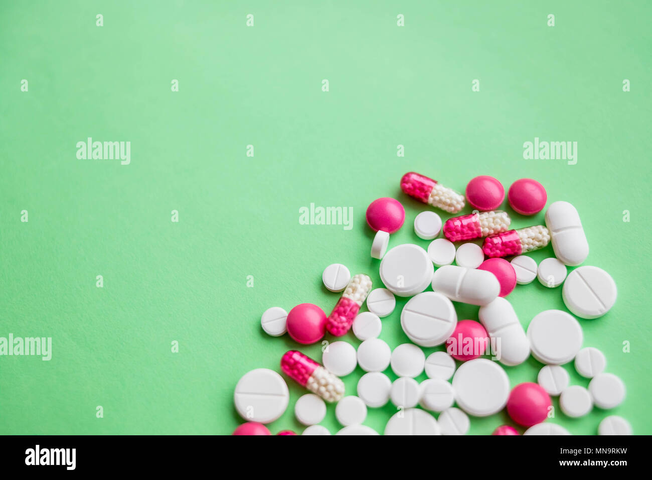 colorful pills and drugs in close up.assorted pills and capsules in ...