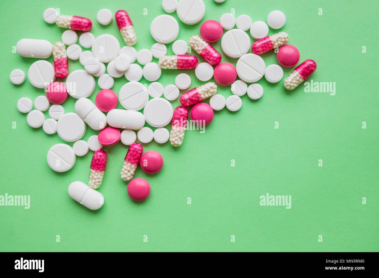 colorful pills and drugs in close up.assorted pills and capsules in ...