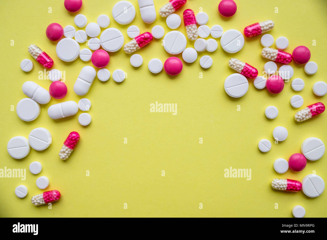 colorful pills and drugs in close up.assorted pills and capsules in ...