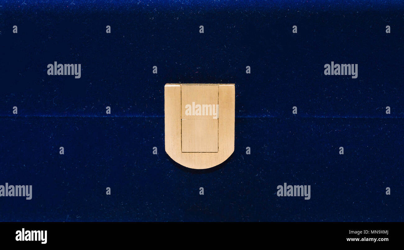 Closed dark blue velvet casket with golden lock isolated Stock Photo ...