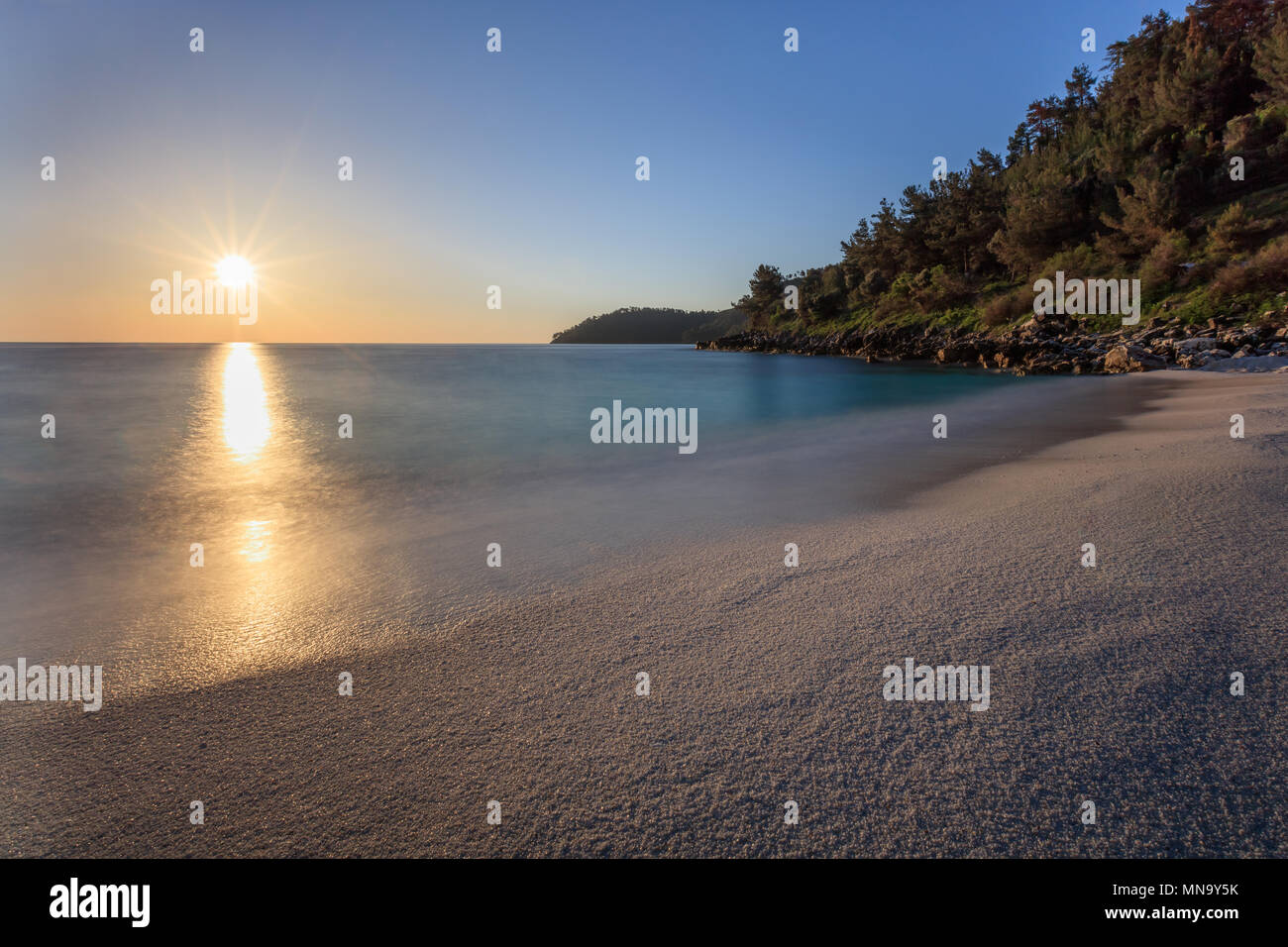 Sunrise in Marble beach (Saliara beach), Thassos Islands, Greece. The ...