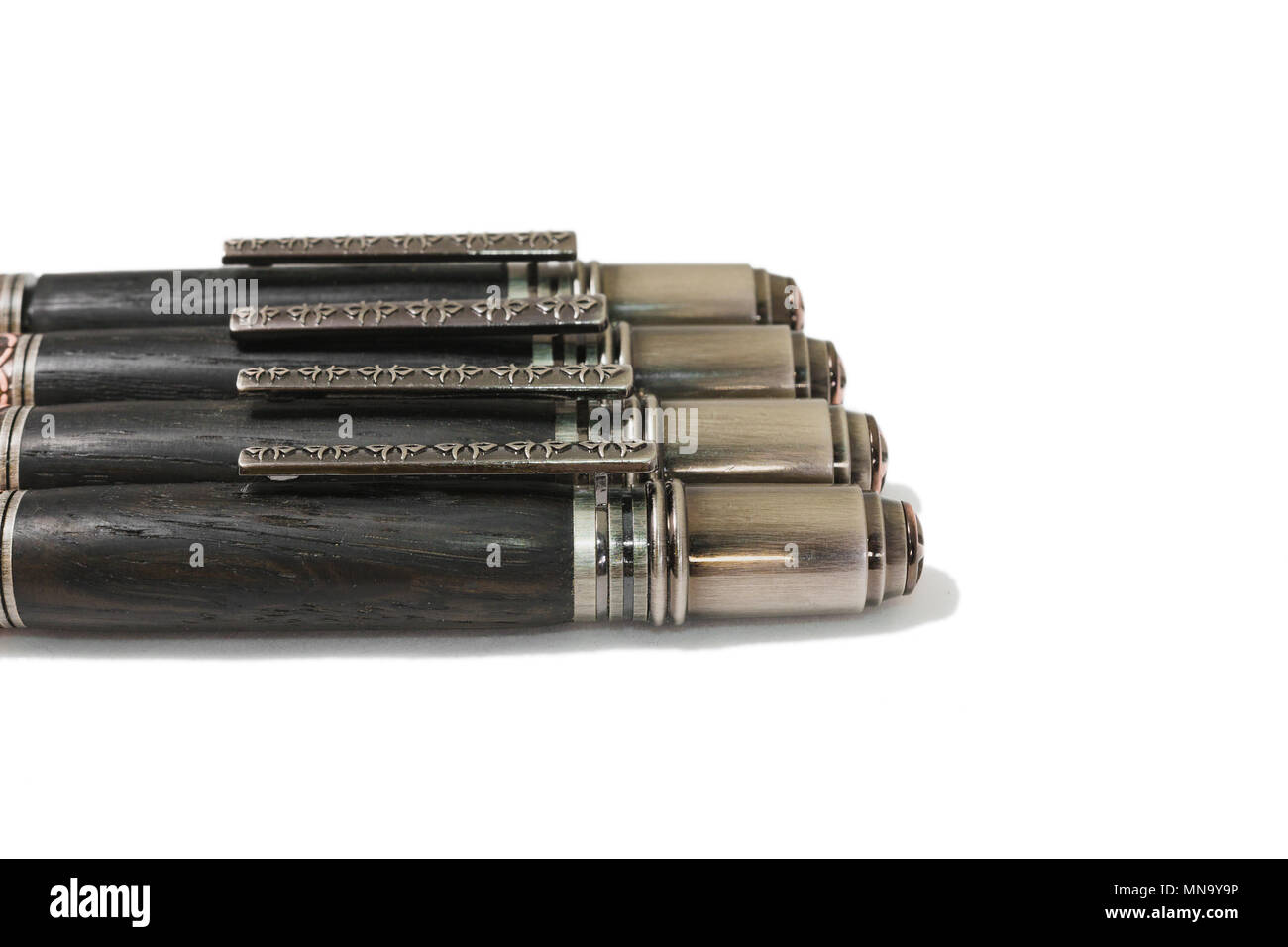 Ballpoint pen made of wood and metal on a white background Stock Photo ...
