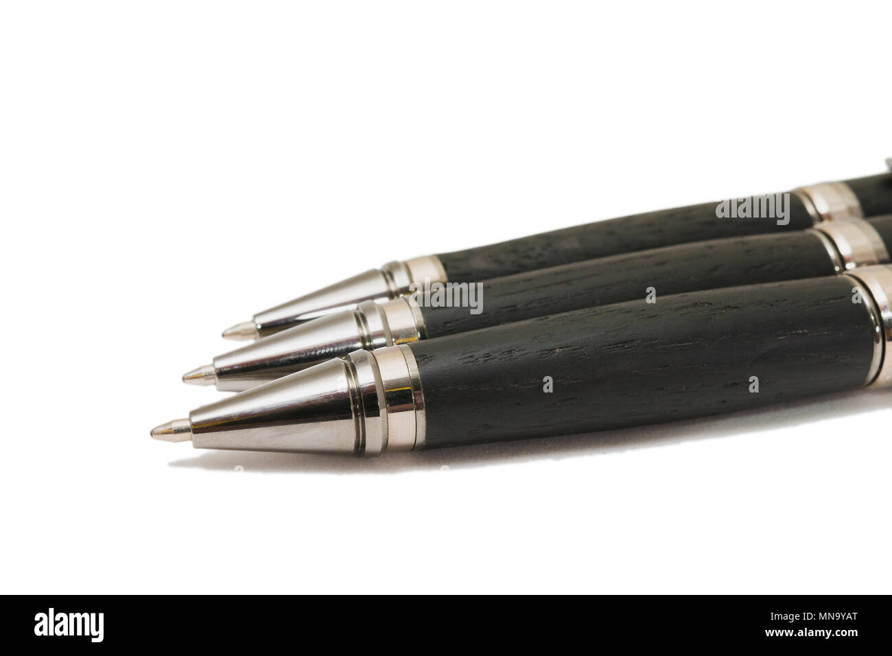 Ballpoint pen made of wood and metal on a white background Stock Photo ...