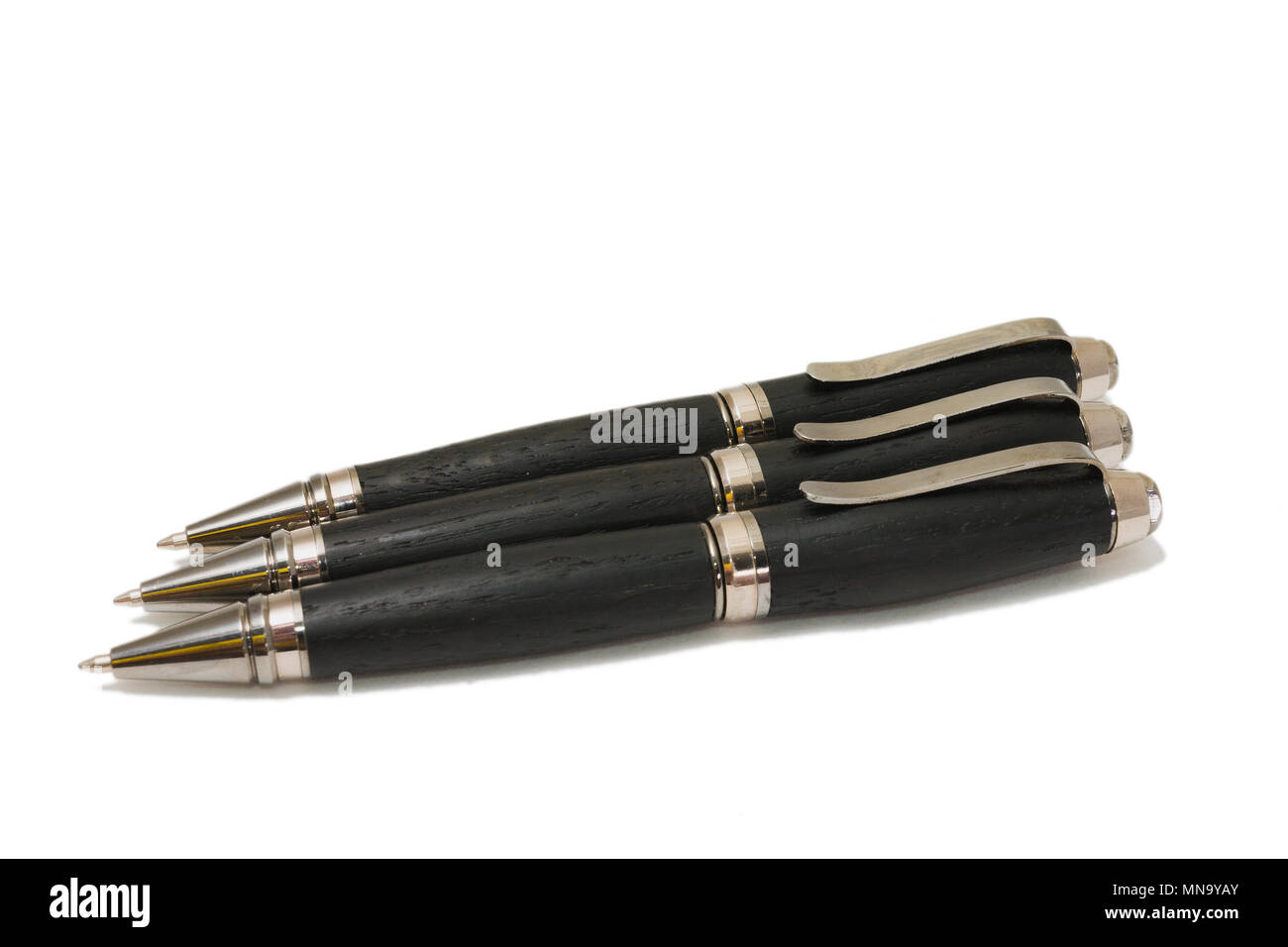 Ballpoint pen made of wood and metal on a white background Stock Photo ...