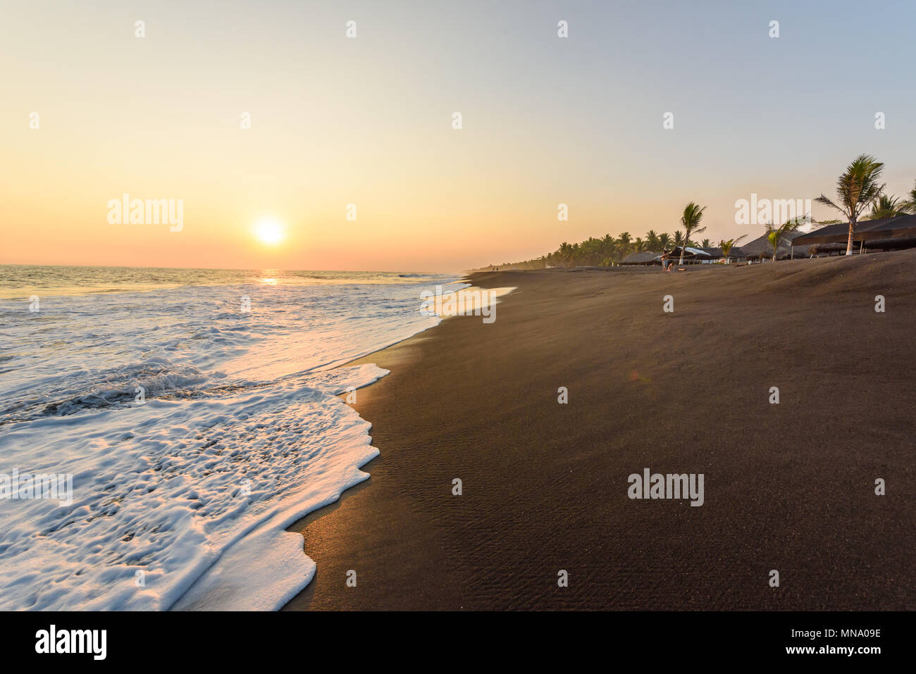 Sunset at Beach with Black Sand in Monterrico, Guatemala. Monterrico is ...