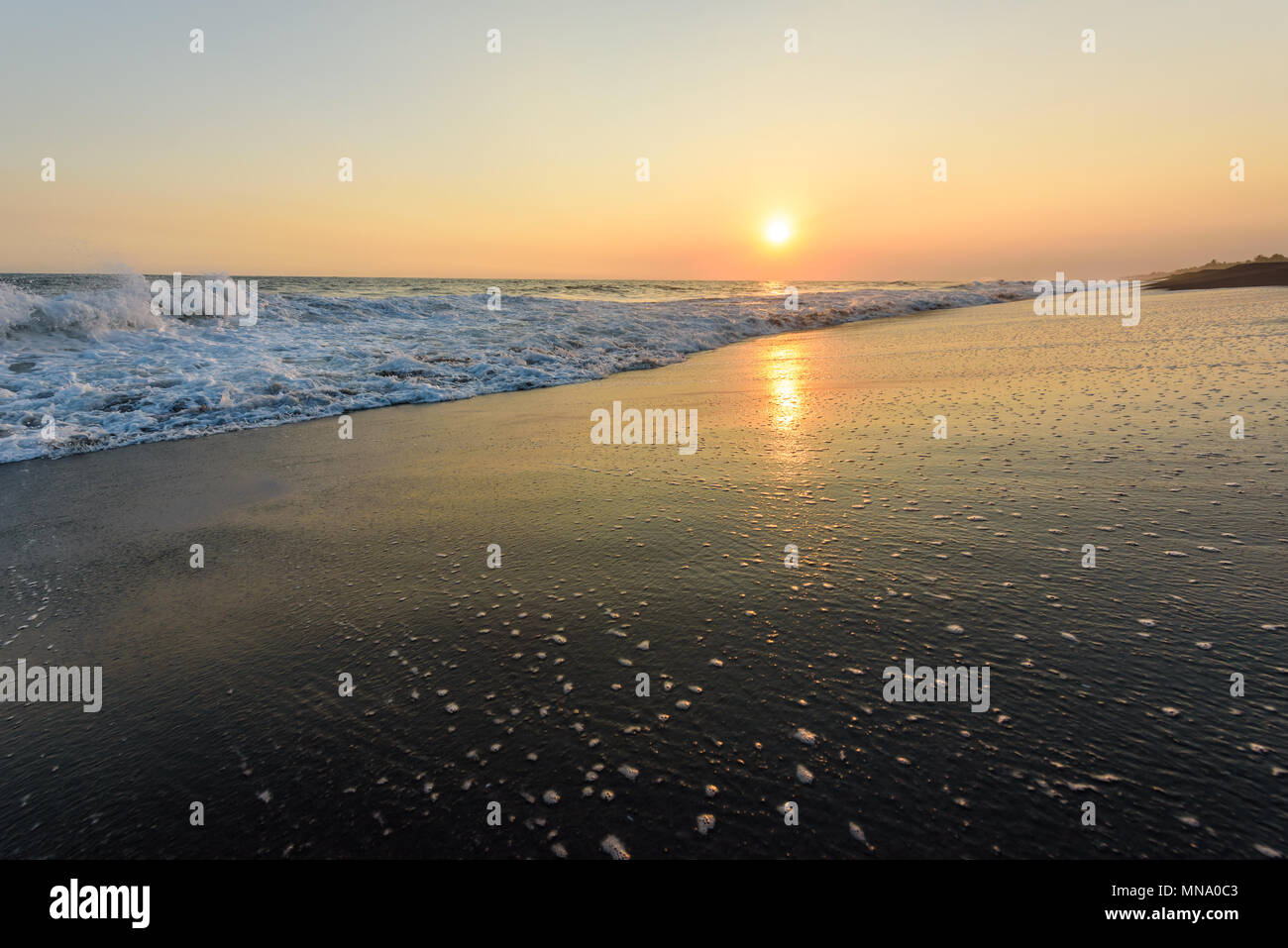 Sunset at Beach with Black Sand in Monterrico, Guatemala. Monterrico is ...