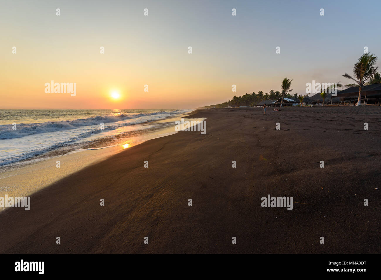 Sunset at Beach with Black Sand in Monterrico, Guatemala. Monterrico is ...