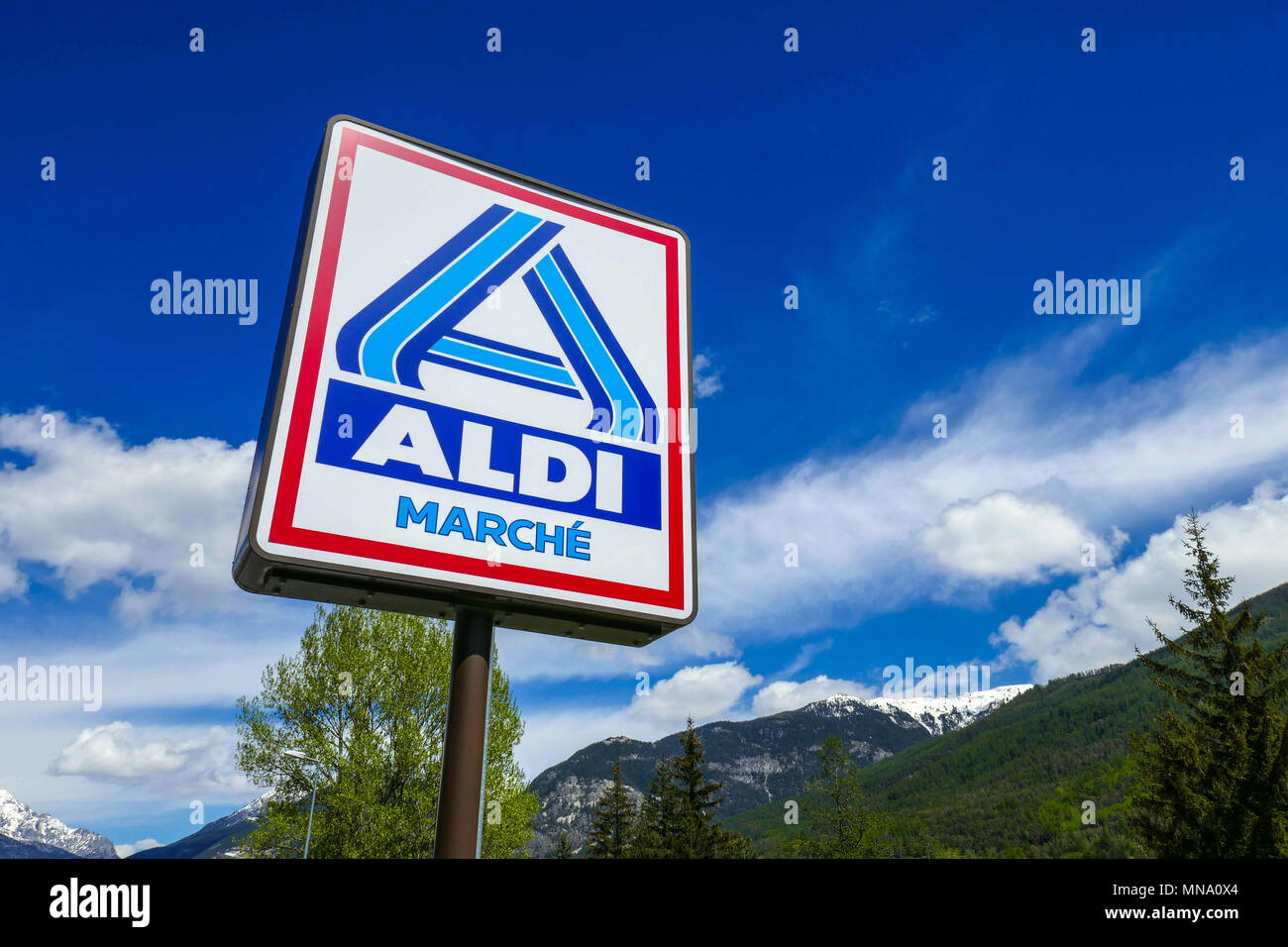 Aldi Marche sign against blue sky, Briancon, France Stock Photo - Alamy