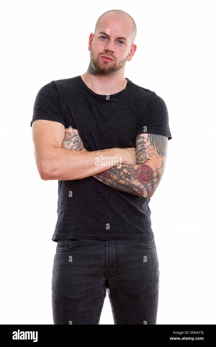 Studio shot of young bald muscular man Stock Photo - Alamy